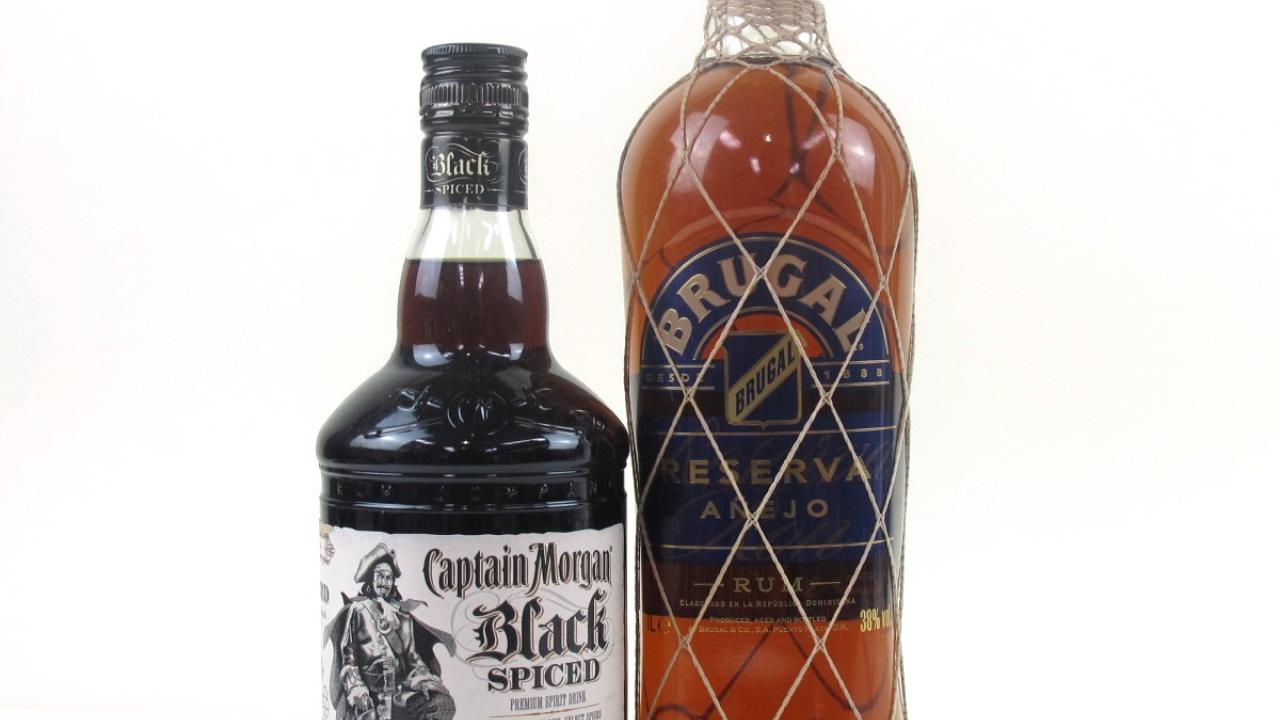Brugal Anejo Dominican Rum 1 Litre and Captain Morgan Black Spiced 70cl ...